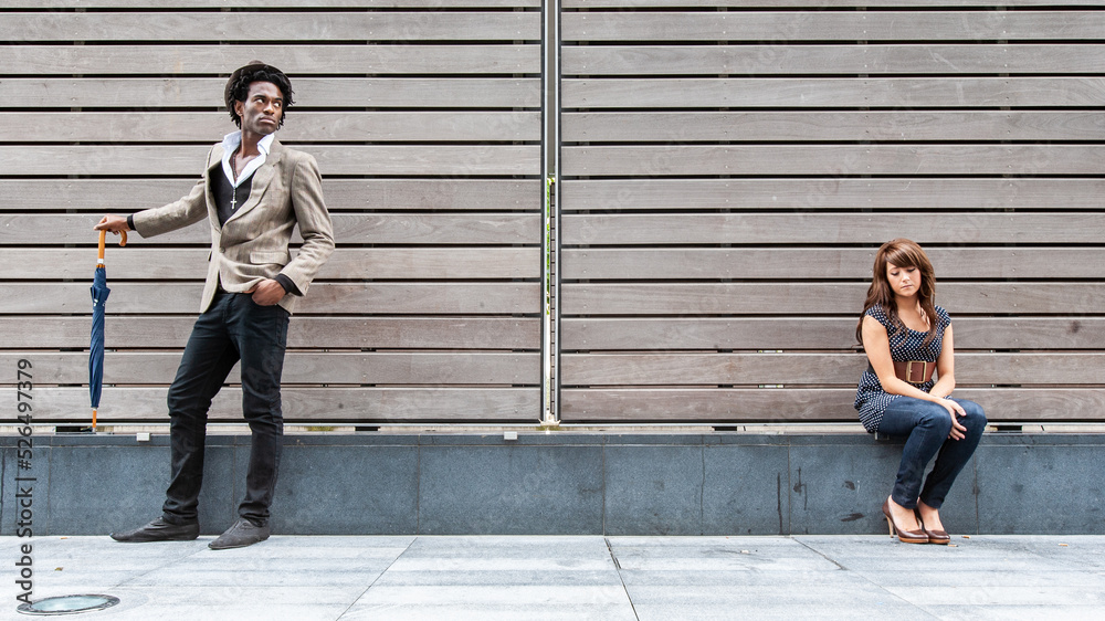 Breaking Down the Wall. Concept of an unstable relationship set against ...