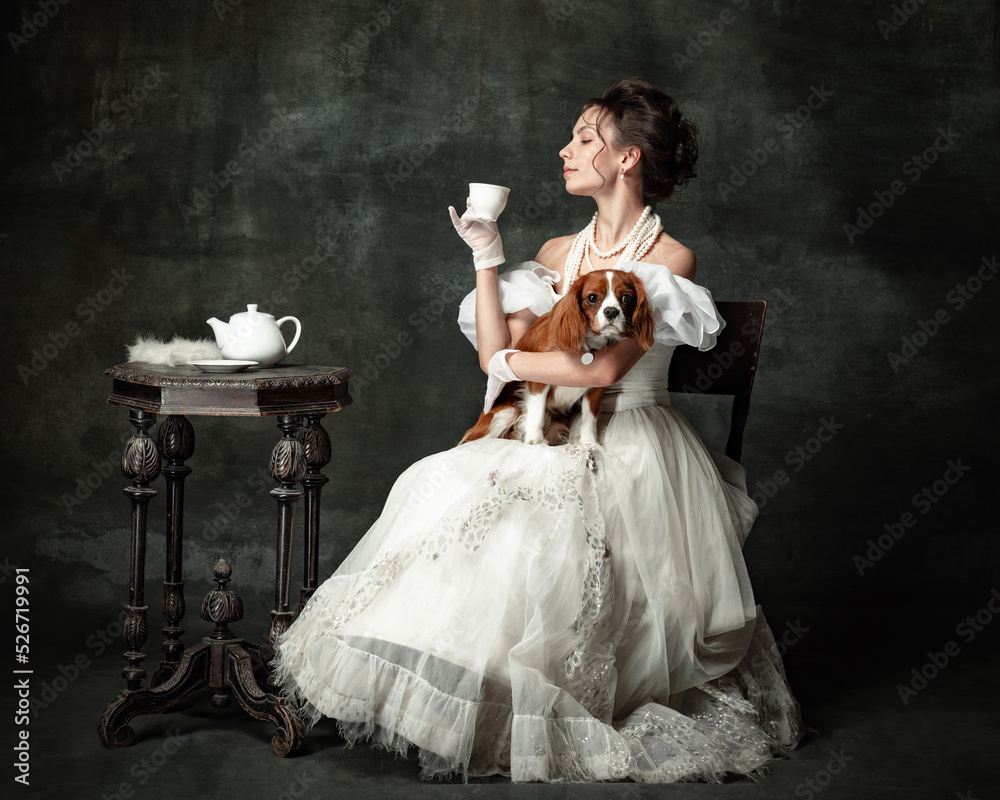 Tea time. Lady with dog. Vintage portrait of young elegant woman in ...