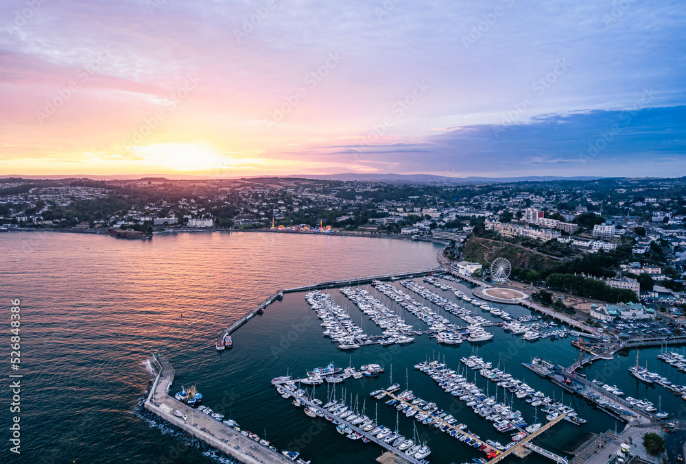 Sunset over Torquay Harbour and Marina, English Riviera from a drone ...