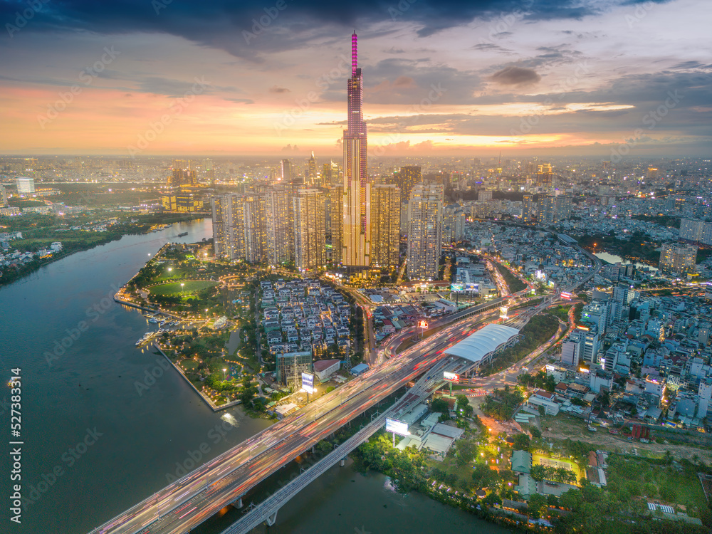 Aerial sunset view at Landmark 81 - it is a super tall skyscraper and ...