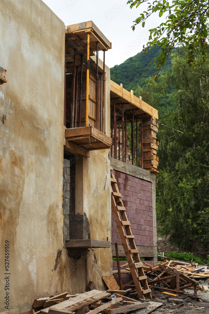 construction of a low house using metal supports. metal formwork at a ...