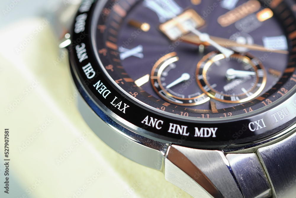 close up shallow focus Time zone cities code on luxury world time watch ...