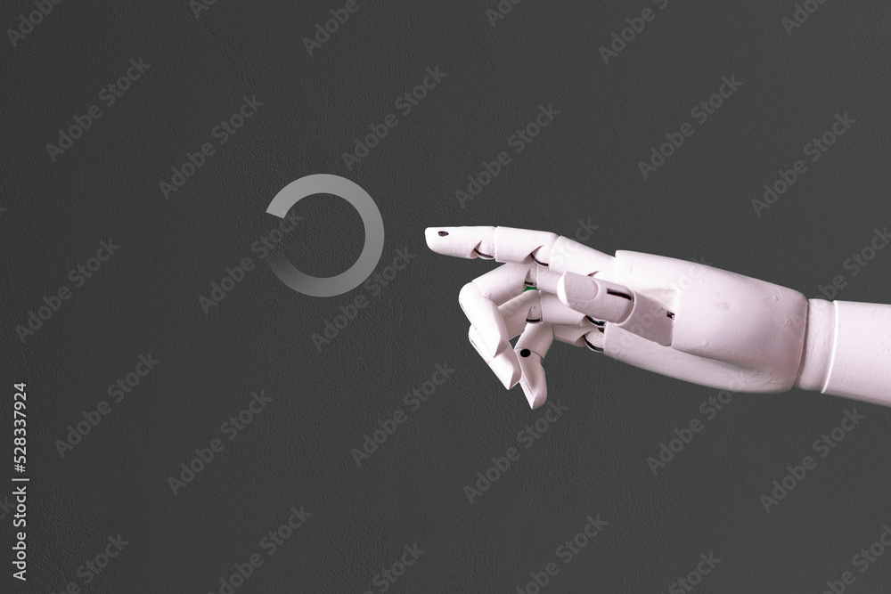 white robotic arm touching the round circle, the symbol of computer ...