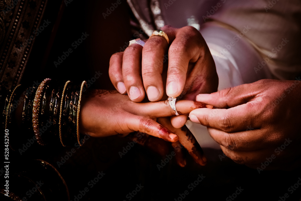 Indian traditional ring ceremony of couples, putting rings. Stock Photo ...