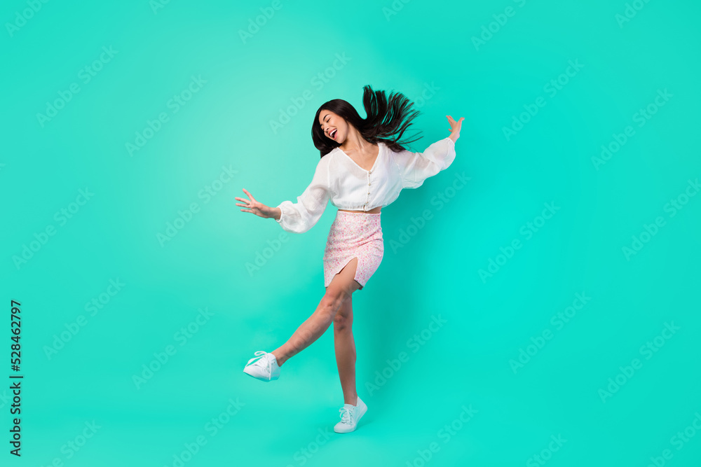 Full body photo of pretty positive malaysian person have fun dancing ...