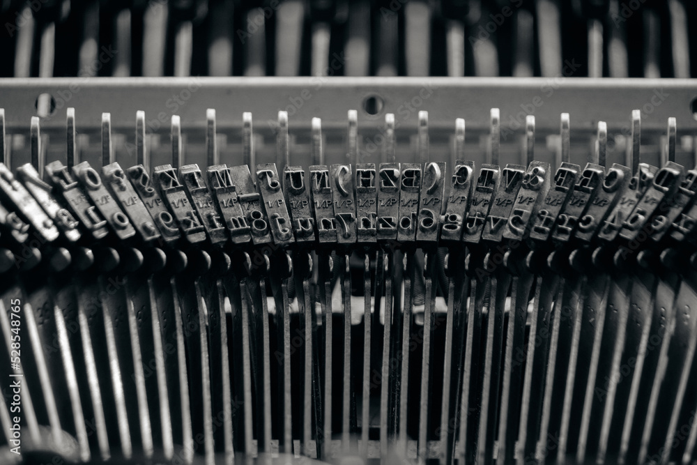 Mechanical hammers with alphabet for typing old typewriter. Stock Photo ...