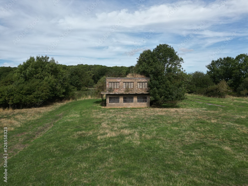 Aerial view of World war two military airfield control tower at Forma ...