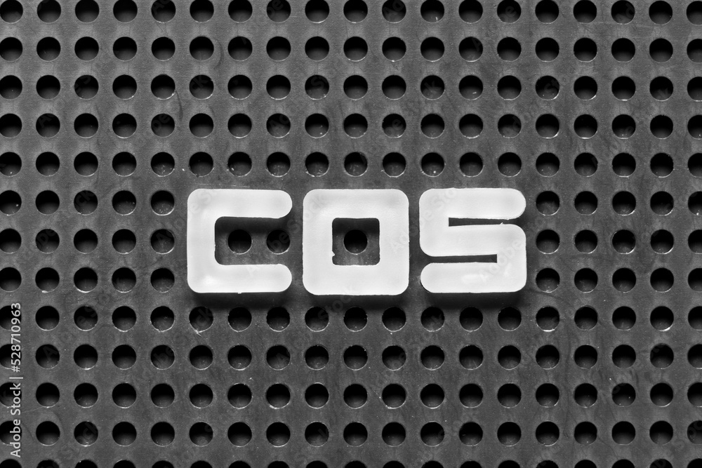 White alphabet letter in word COS (Abbreviation of Cost of sales, Class ...