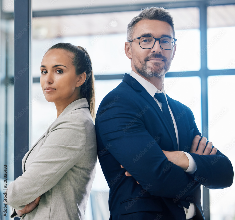 Partnership, arms crossed and teamwork with two business people ...