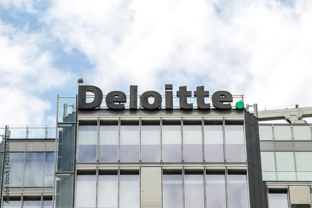 Photo Stock Bucharest, Romania - Aug 2022: Deloitte sign on the ...
