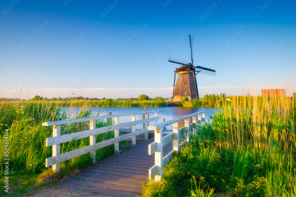 Kinderdijk National Park in the Netherlands. Windmills at the day time ...
