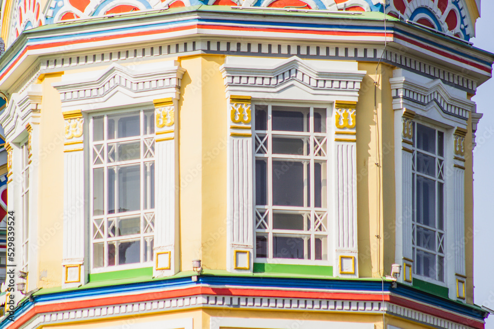 Ascension Cathedral wooden window frame on yellow wall, Russian ...