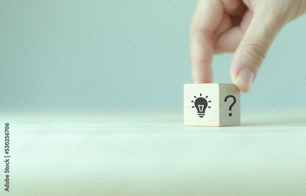 Question marks and light bulb symbolizing idea or solution. Problem solving skill, creativity ...