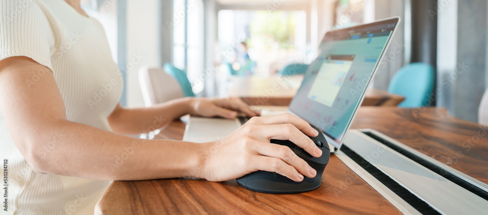woman hand using computer ergonomic mouse, prevention wrist pain ...