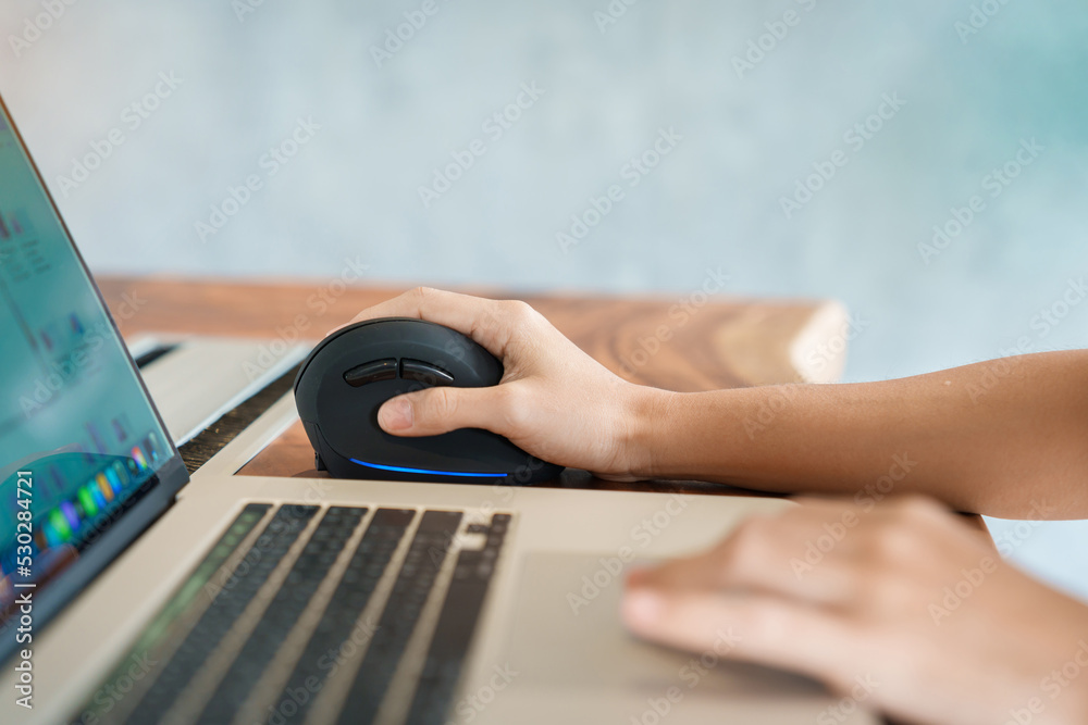woman hand using computer ergonomic mouse, prevention wrist pain ...