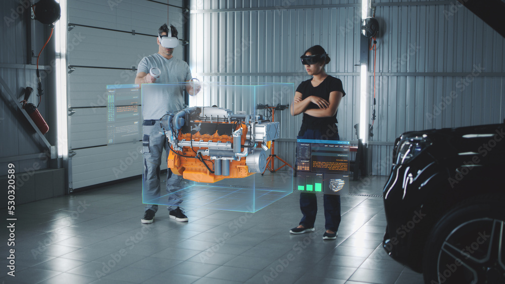 Two service manager engineers use virtual reality technology to ...