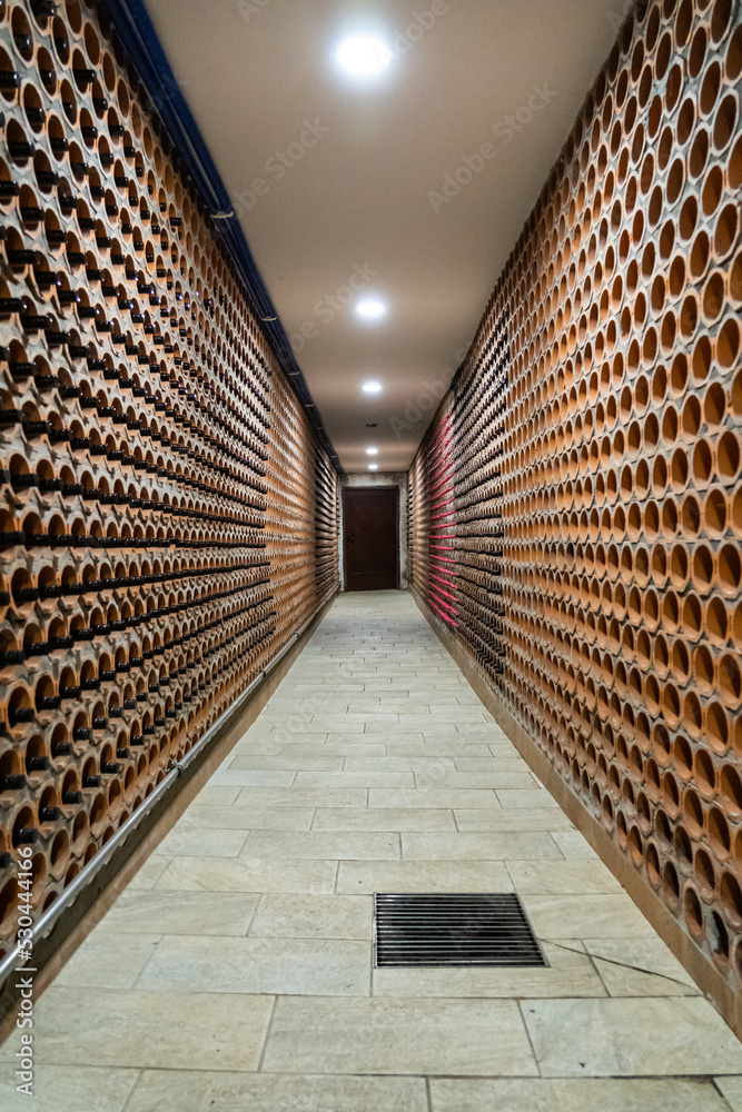 Wine racks on both sides made of brickstone material for bottles ...