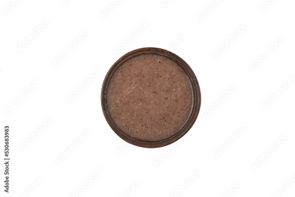 Ragi Porridge sweetened with jaggery in clay cup on white background ...