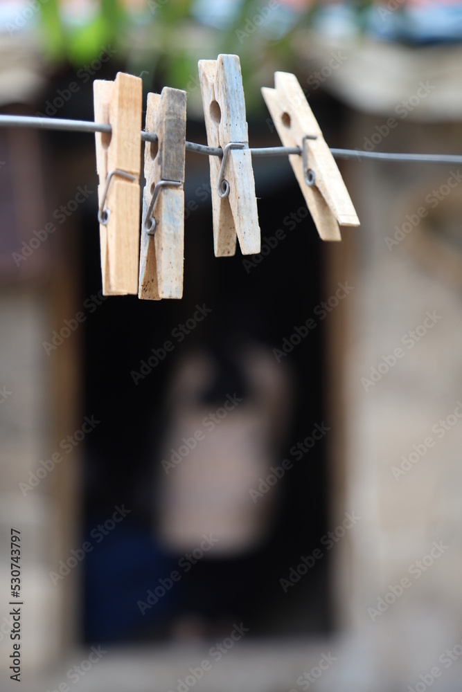 clothes peg on a clothesline Stock Photo | Adobe Stock