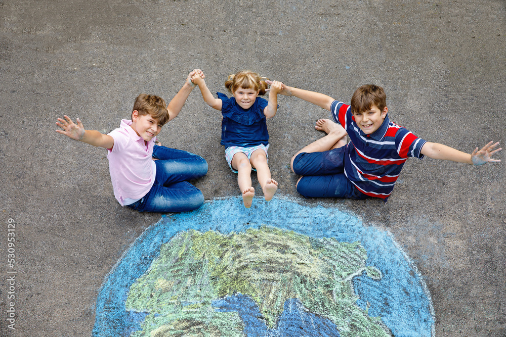 Little preschool girl and two school kids boys with earth globe ...