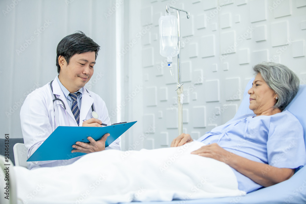 asian doctor with stethoscope and document folder, examine the symptom ...