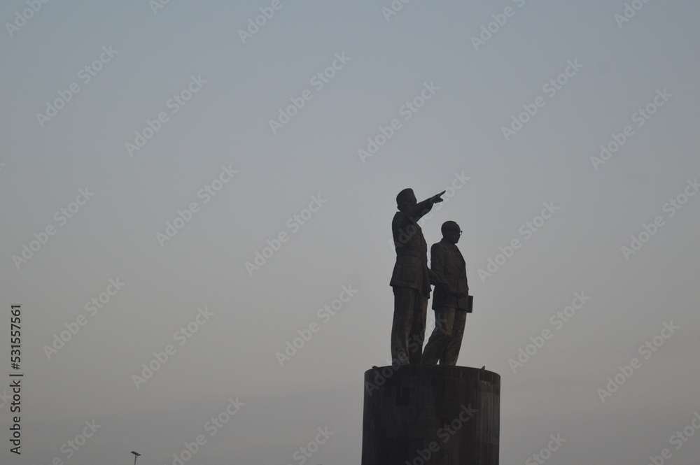 Silhouette of statues of Indonesian national figures, namely the first ...