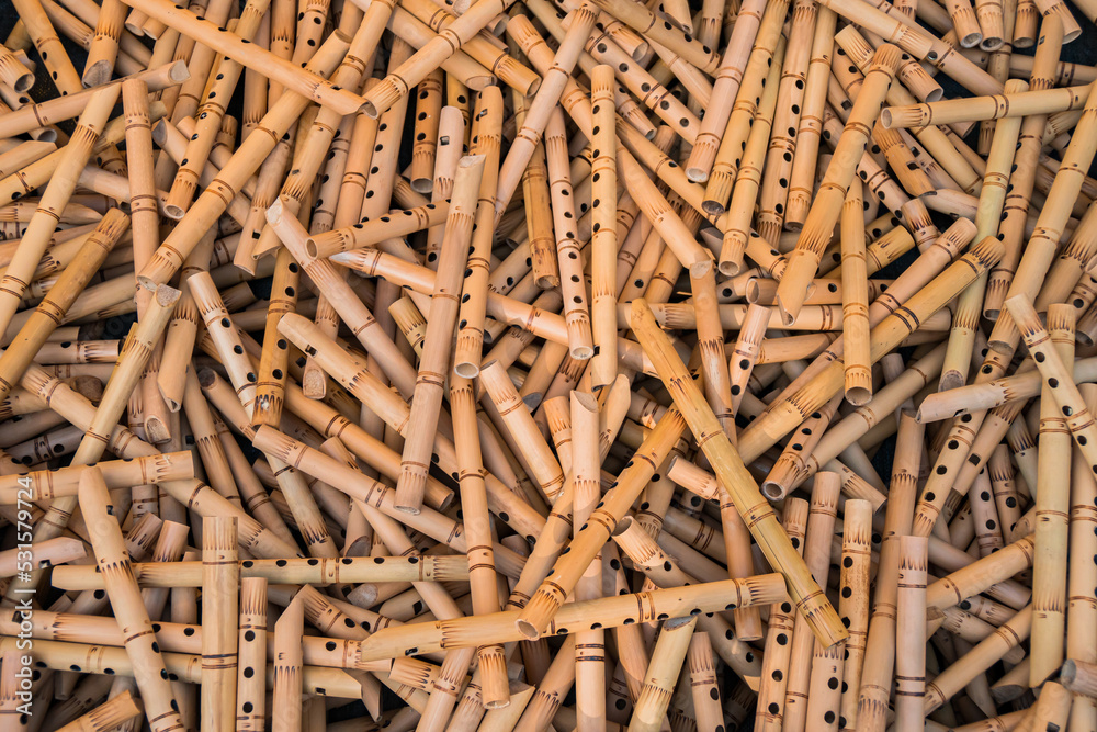 Pile of half-finished bamboo flutes, handmade bamboo flute production ...