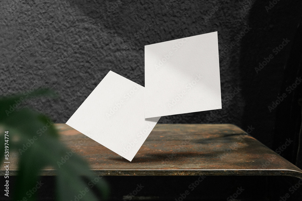 Clean minimal square flyer mockup floating on top bench with leaves ...