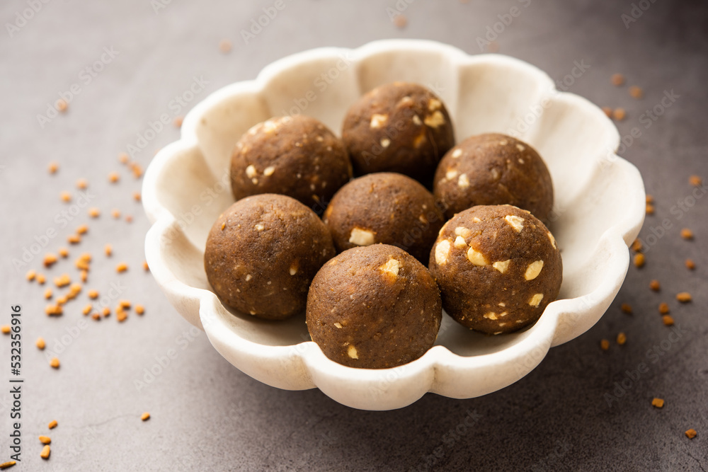 Fenugreek or methi ke Laddu, laddo or laddoo or sweet mithai balls for ...