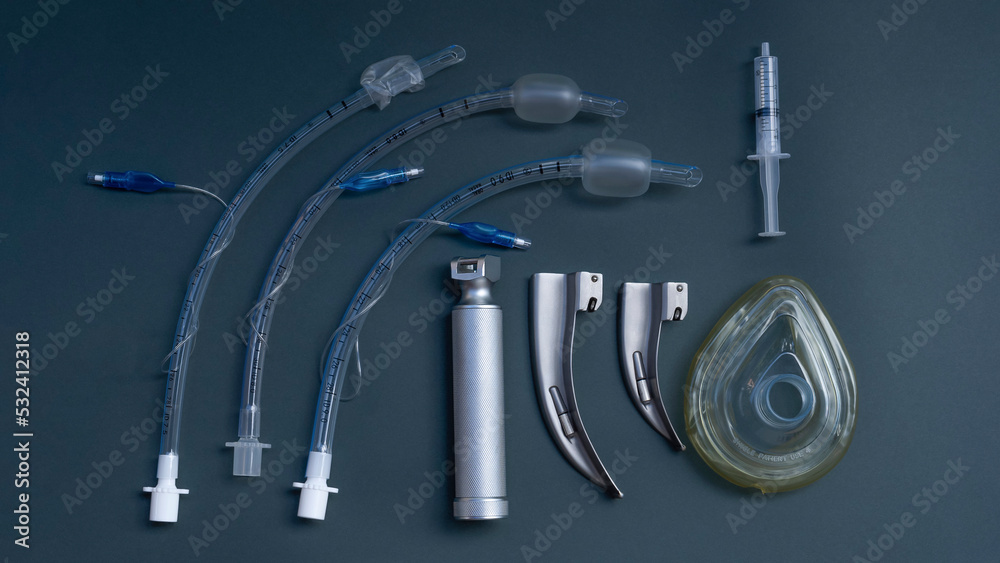 tracheal intubation kit: laryngoscope, several laryngoscope blades and ...