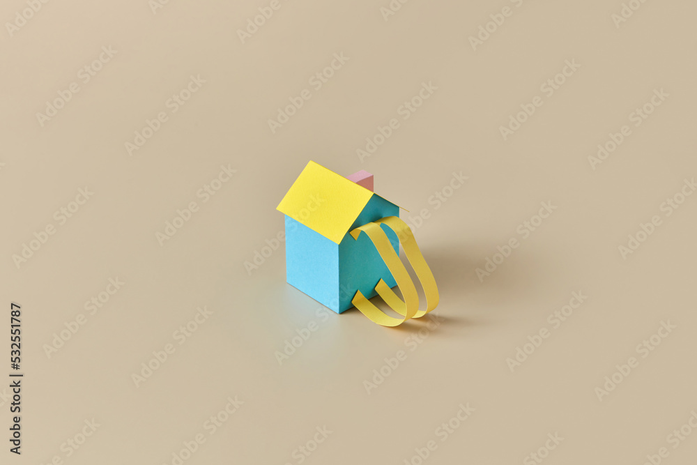 Paper craft backpack in shape of house. Stock Photo | Adobe Stock