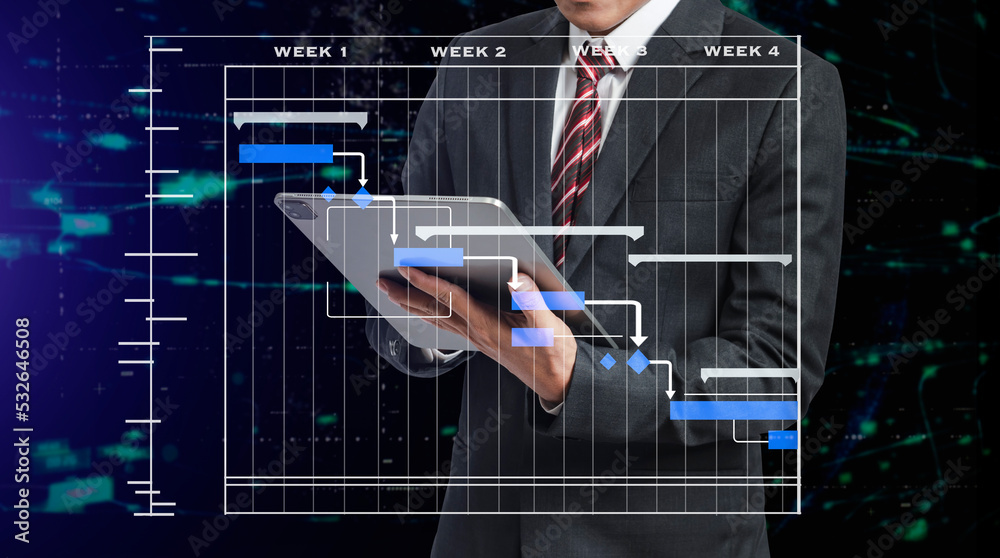 ภาพถ่าย Stock Project manager working and update tasks with milestones ...
