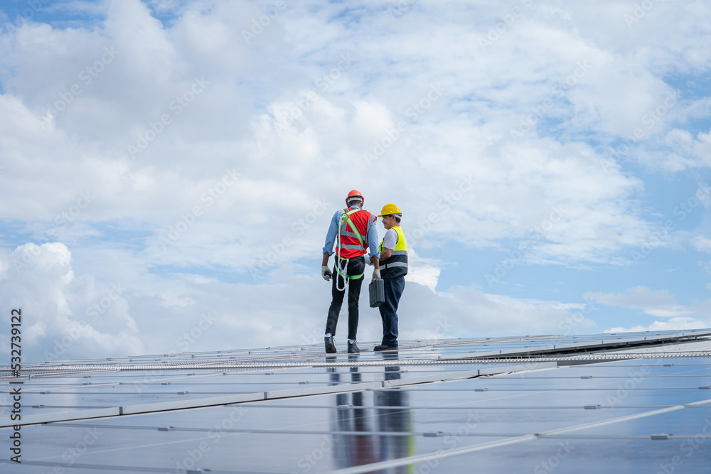 Engineer team working on replacement solar panel in solar power plant ...