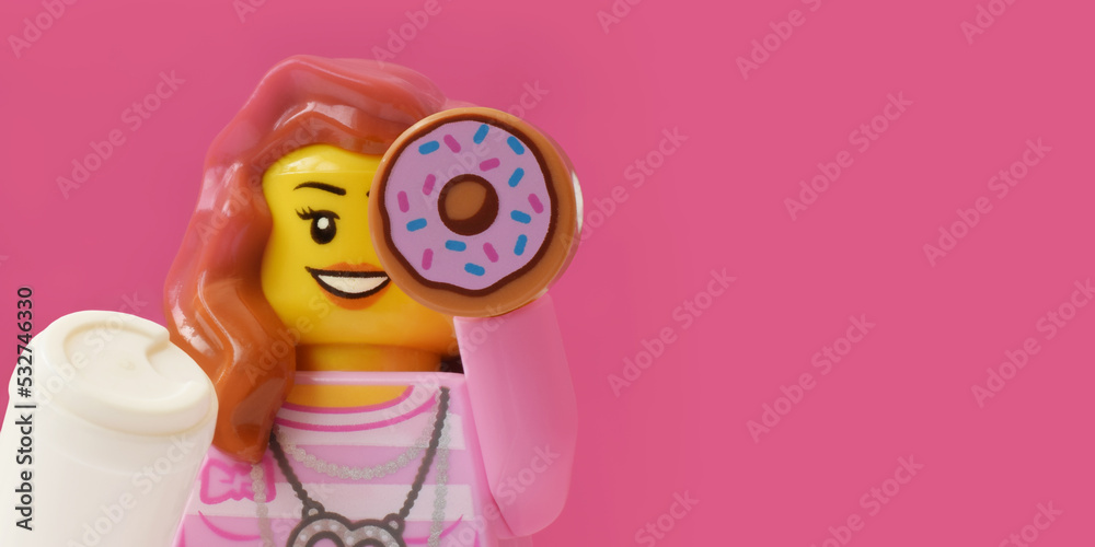 Lego minifigure happy cute girl with donut and coffee to go cup ...