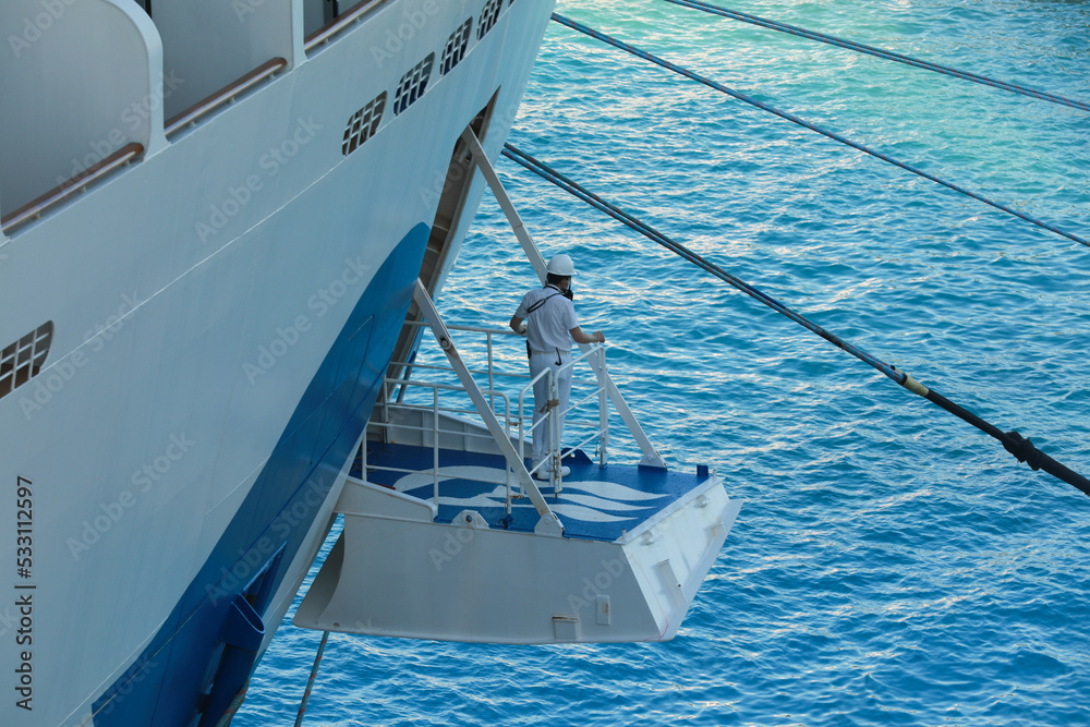 Ship's officer standing on the mooring platform to oversee the safety ...