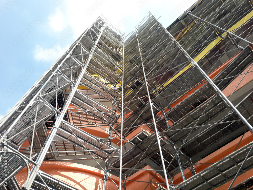Scaffolding house. School. Building. High-rise, renovation. Scaffolding ...
