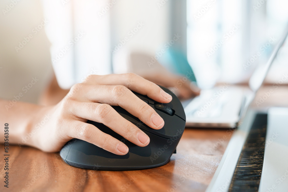 woman hand using computer ergonomic mouse, prevention wrist pain ...