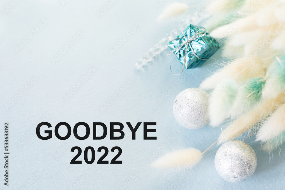 Goodbye 2022 text on a festive blue background Stock Photo | Adobe Stock