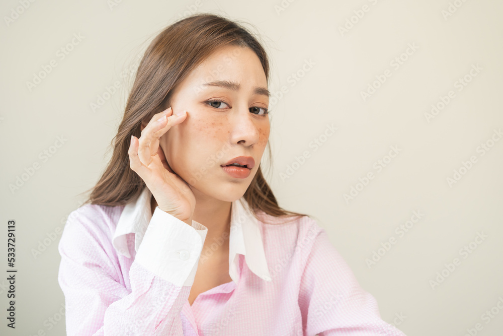 Dermatology, expression face worry, stressed asian young woman hand ...
