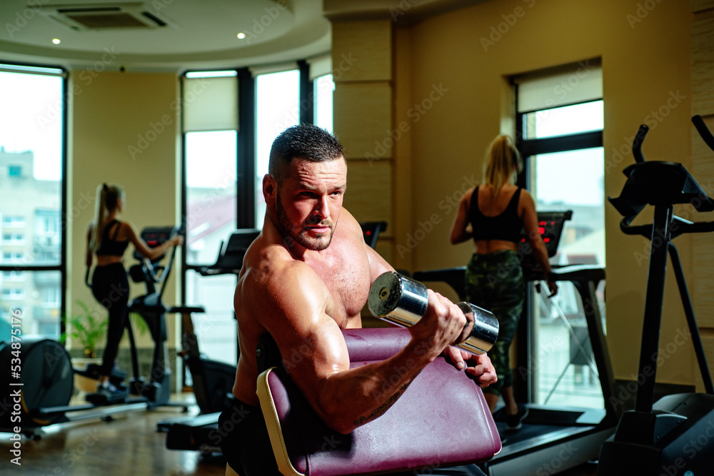 Power, strength and healthy lifestyle, sport. Man training with ...