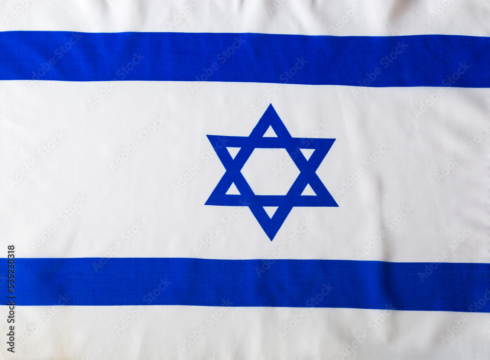 Star of david on israeli flag. Flag of Israel in the background. Jewish ...