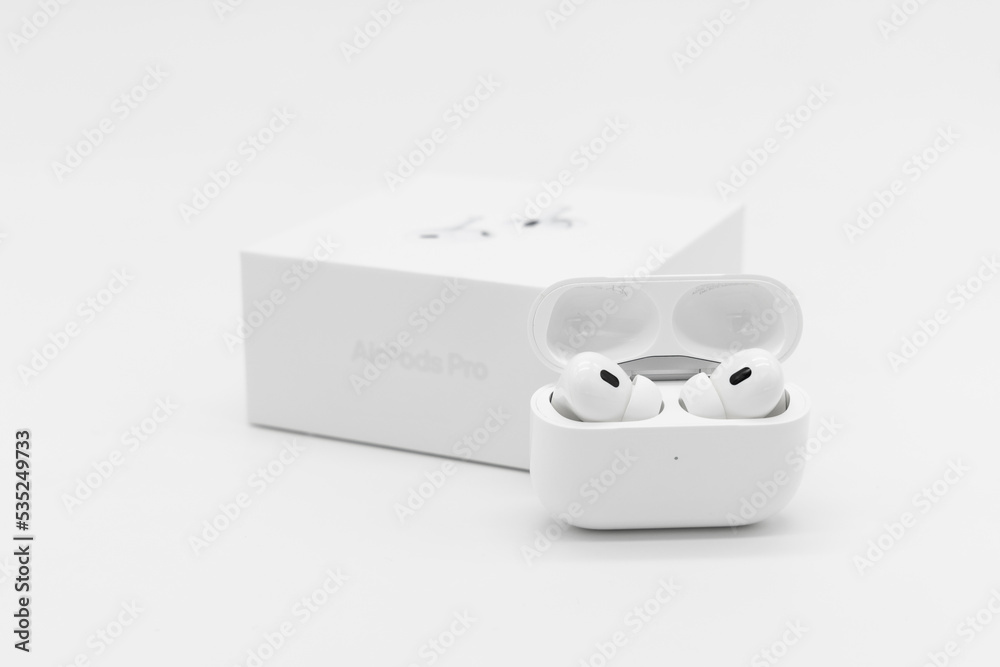 Apple AirPods Pro 2nd generation inside case next to packaging box on ...