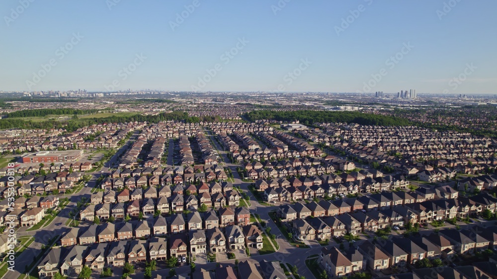 Aerial footage of Canadian town showing suburban housing estates in ...
