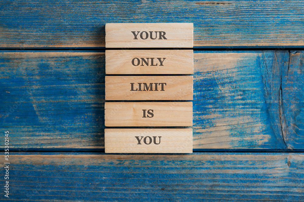 Your only limit is you sign written on a stack of five wooden pegs ...