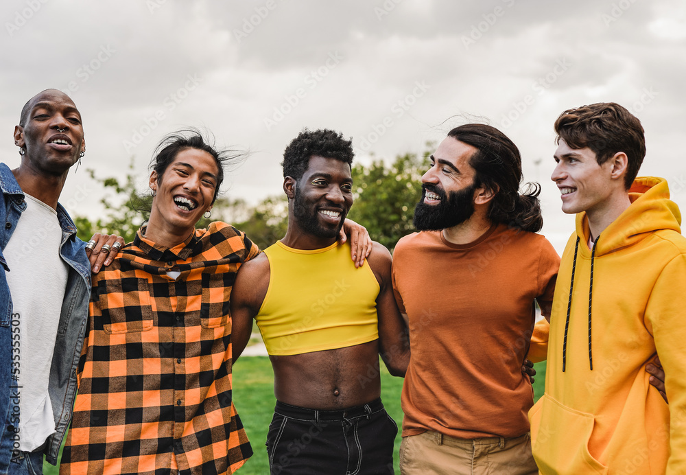 Group of multiethnic men having fun together outdoor - Concept of ...