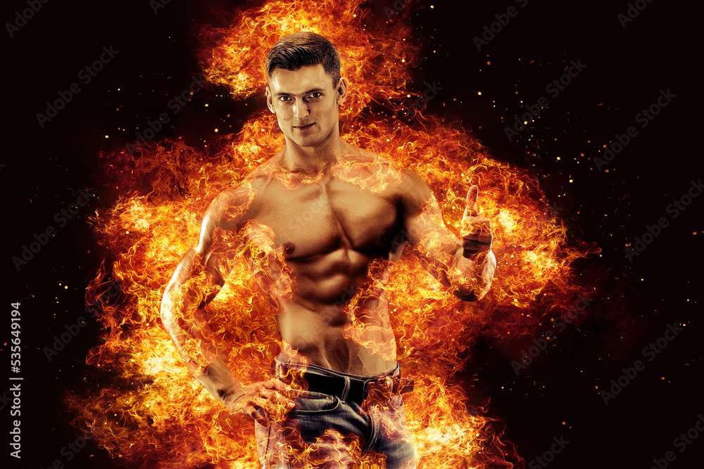 Bodybuilder posing on the fire flames background Stock Photo | Adobe Stock
