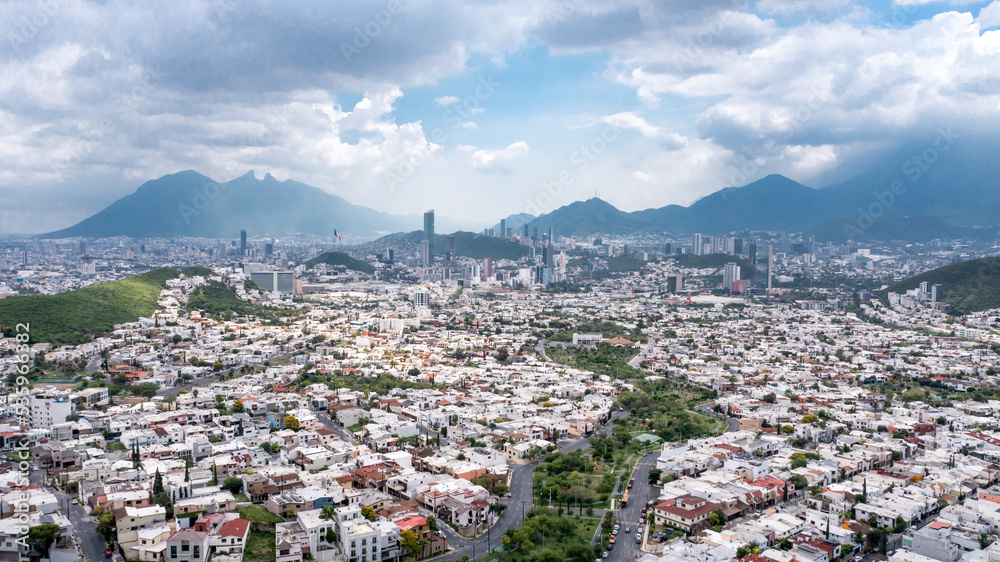 Drone photo of Monterrey city skyline with blue sky and clouds, famous ...