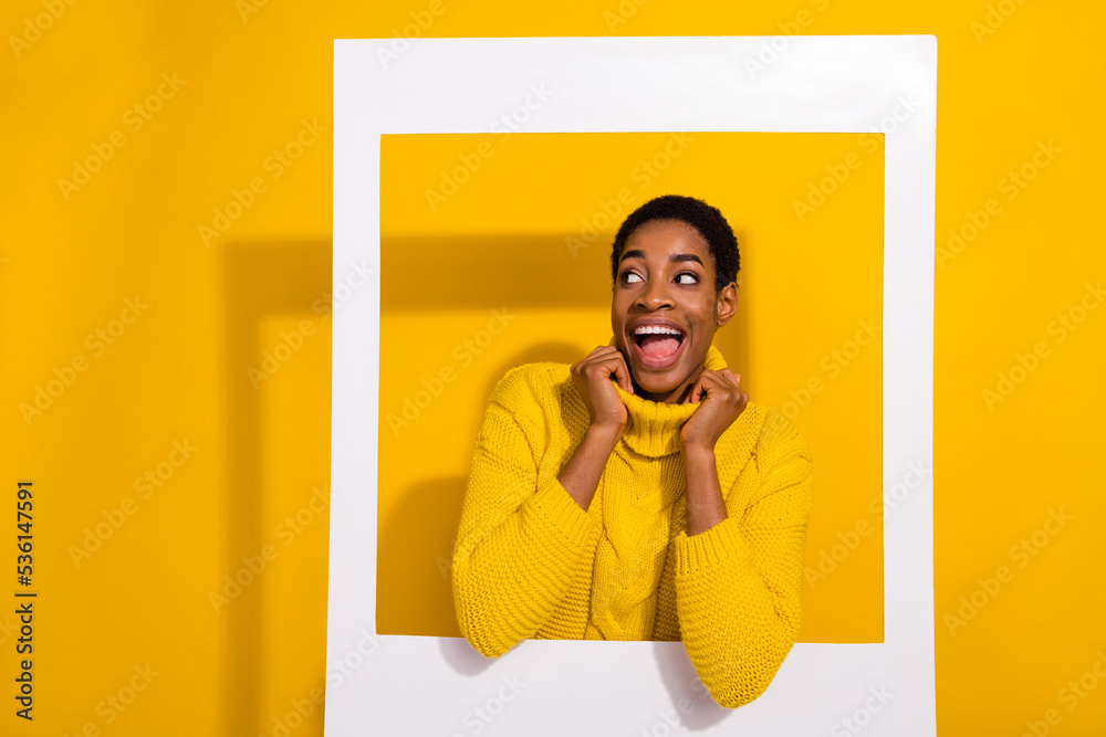 Portrait of attractive cheerful funky curious girl looking out frame ...