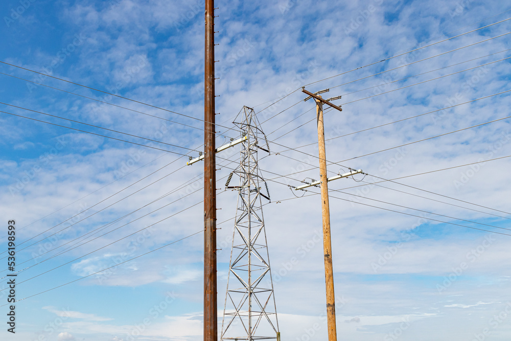 Electricity transmission tower, wood and steel utility power poles ...