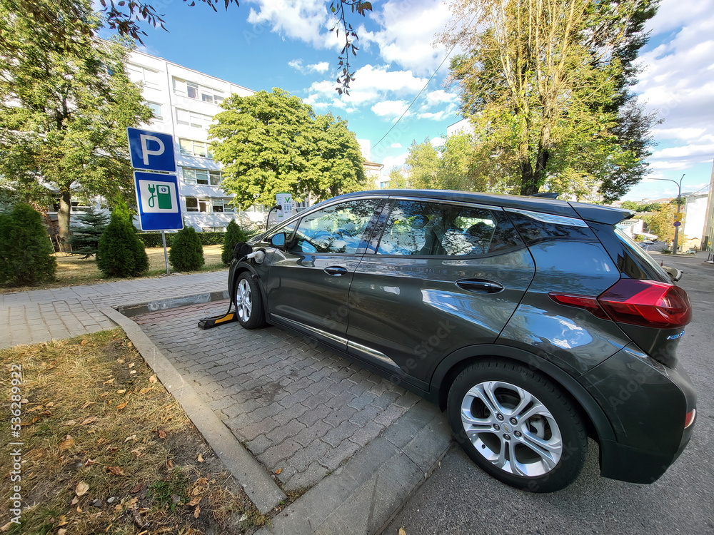 Minsk, Belarus. Sep 2022. Chevy Bolt EV electric car charging at public ...